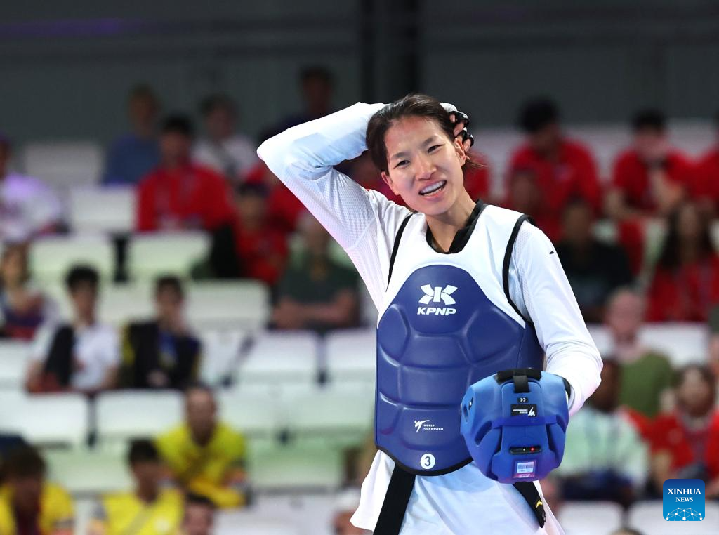 Guo Qing wins taekwondo women's 53kg category final at Rhine-Ruhr 2025 FISU Universiade - People ...