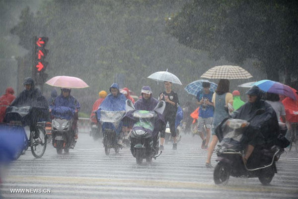 China continues blue alert for rainstorms - People's Daily Online