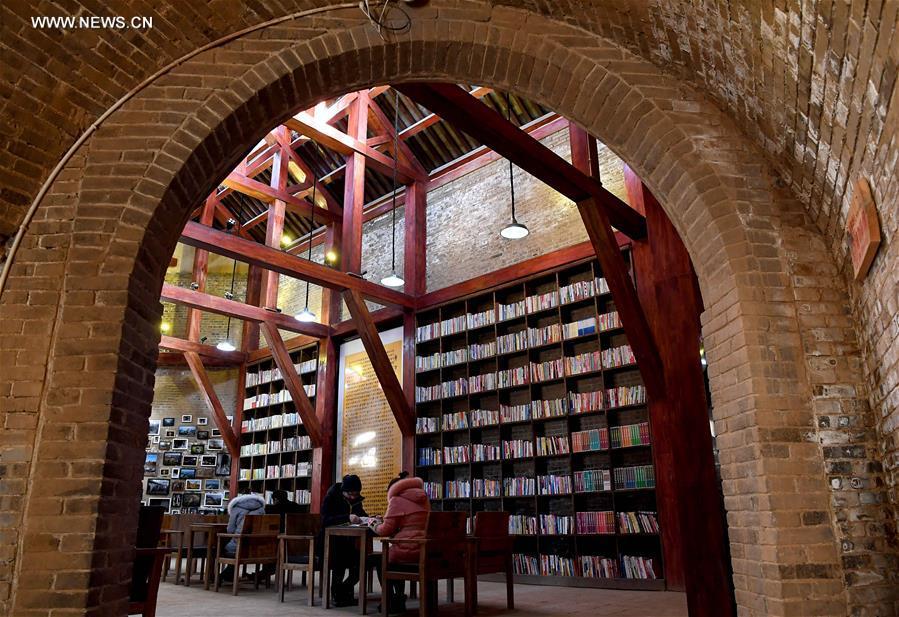 Cave dwelling library opens to public for free in Henan - People's ...