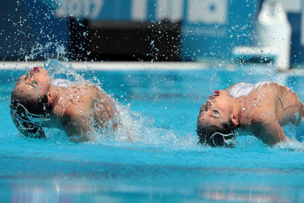 China's synchronized swimming sisters return to claim silver - People's ...
