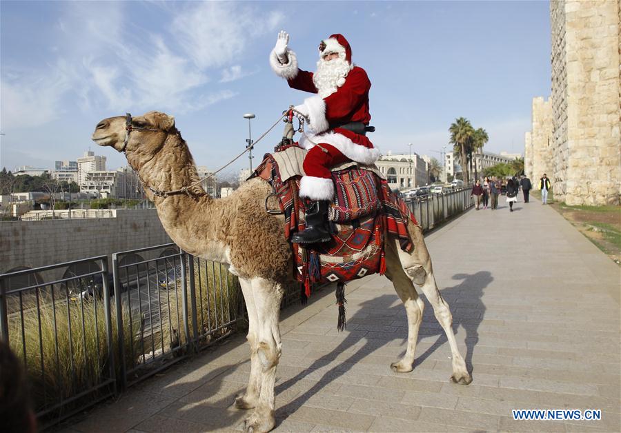Man dressed as Santa Claus rides camel in Jerusalem's Old City - People ...