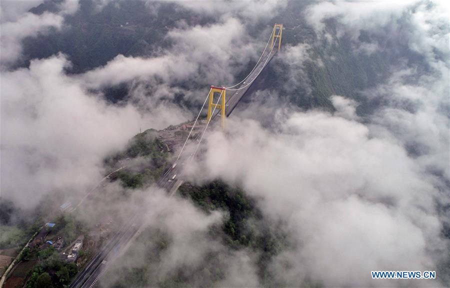 Bridge enveloped by clouds and fog in Enshi, central China's Hubei ...