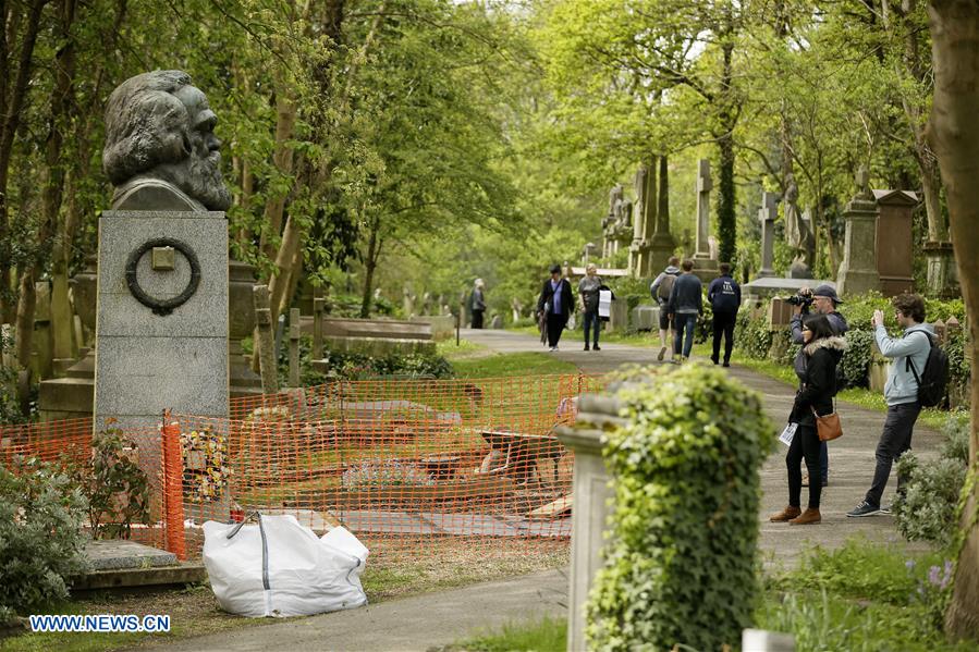 People visit tomb of Karl Marx at Highgate Cemetary in London, Britain ...