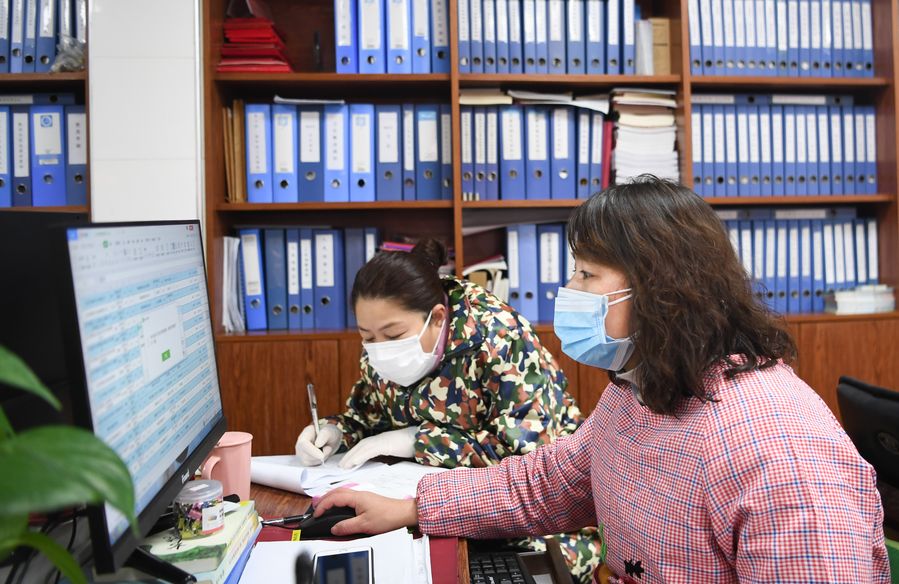 China to boost precise prevention, care for frontline community workers ...